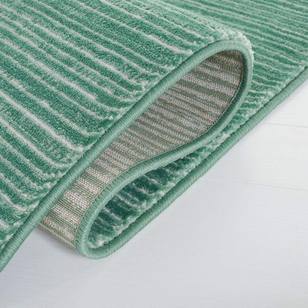 solid light green area rug